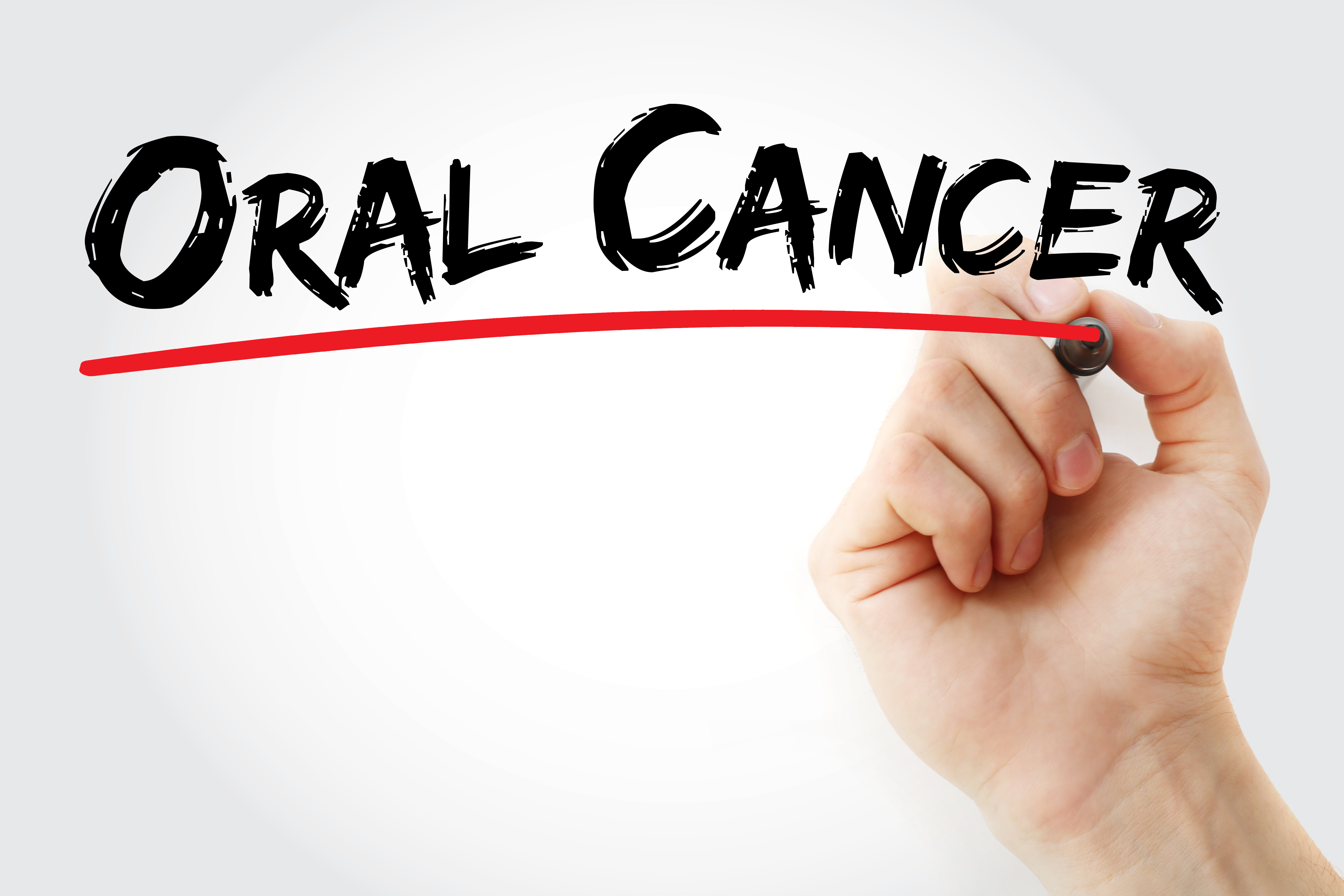 Hand writing Oral Cancer with marker, health concept background ...